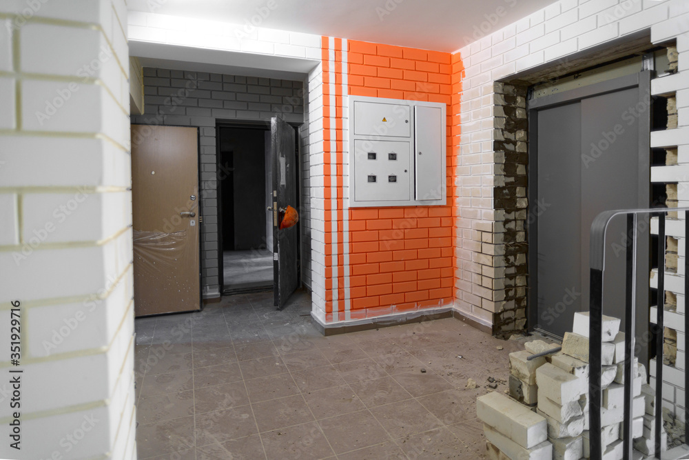Construction of a new residential building. New bright corridor of an ...
