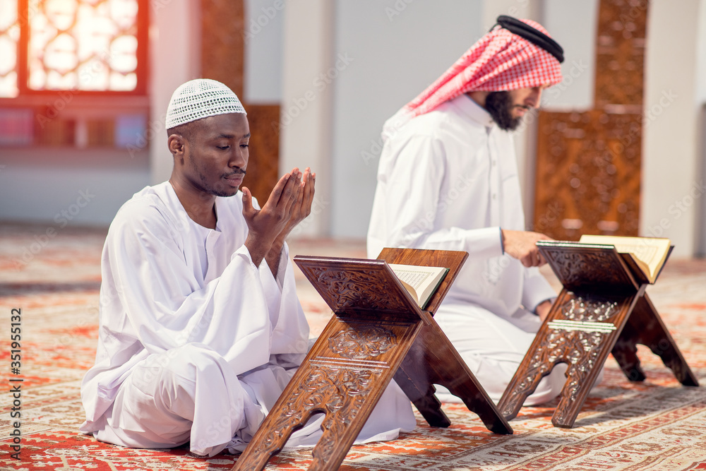 Religious black muslim man praying inside the mosque Stock Photo ...