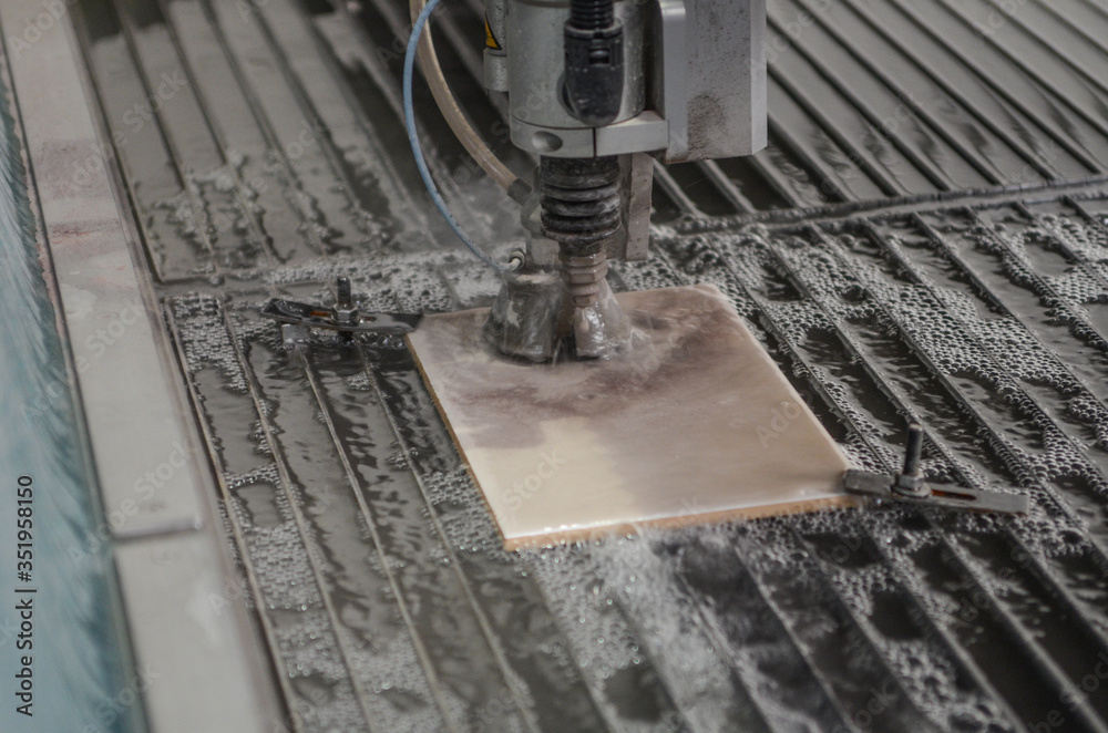 Water jet machine at work Cnc water jet machine Stock Photo | Adobe Stock