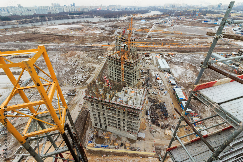 Pile driving in foundation pit for construction of apartment building ...
