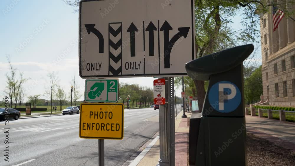 Traffic signs in Washington DC showing Photo Enforced, Parking, and ...