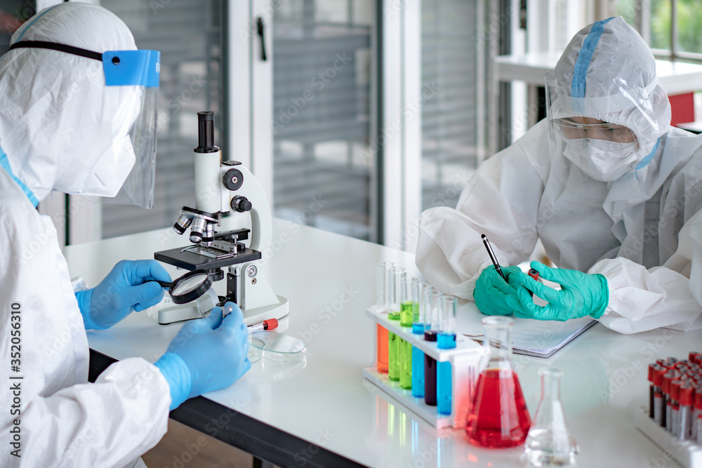 close up picture of scientist wearing persona; protective equipment or ...