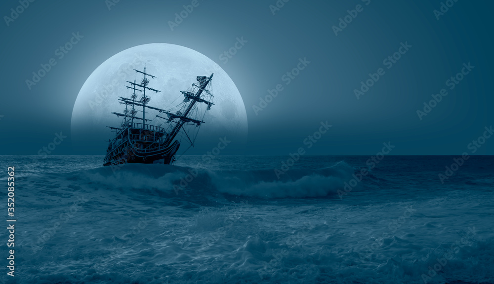 Sailing old ship in storm sea - Night sky with moon in the clouds ...