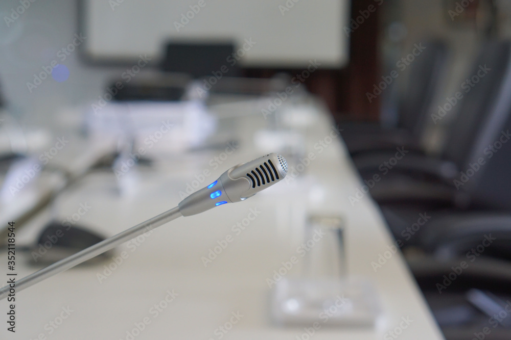 Meeting mic installed on the table in the meeting room. Stock Photo ...
