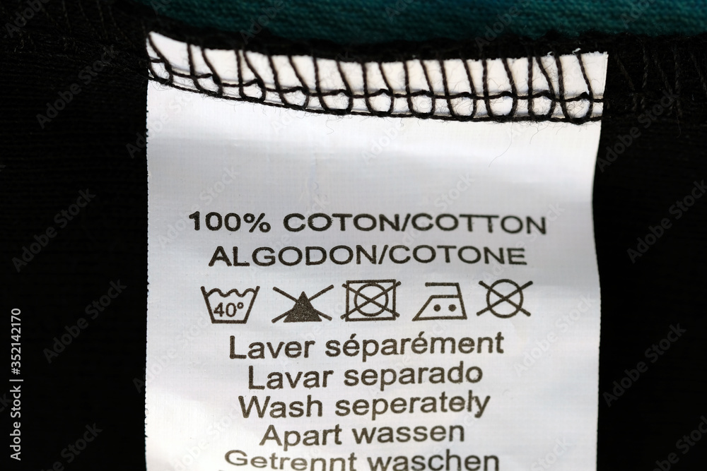 Label with washing instructions. White label with instructions for the ...