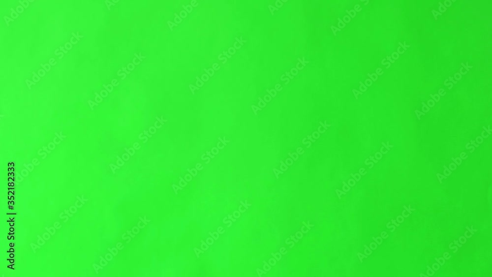 Sign of the horns with fingers on green screen. Simbol of heavy metal ...