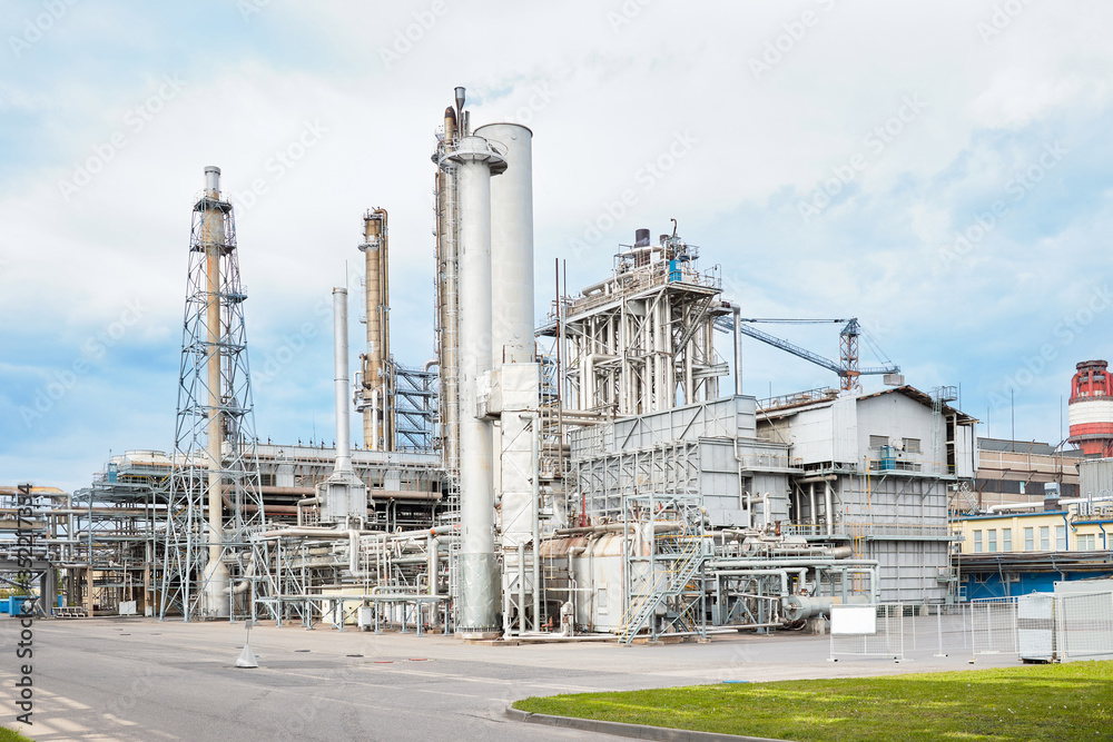 Exterior of modern of petrochemical installation with silver colored ...