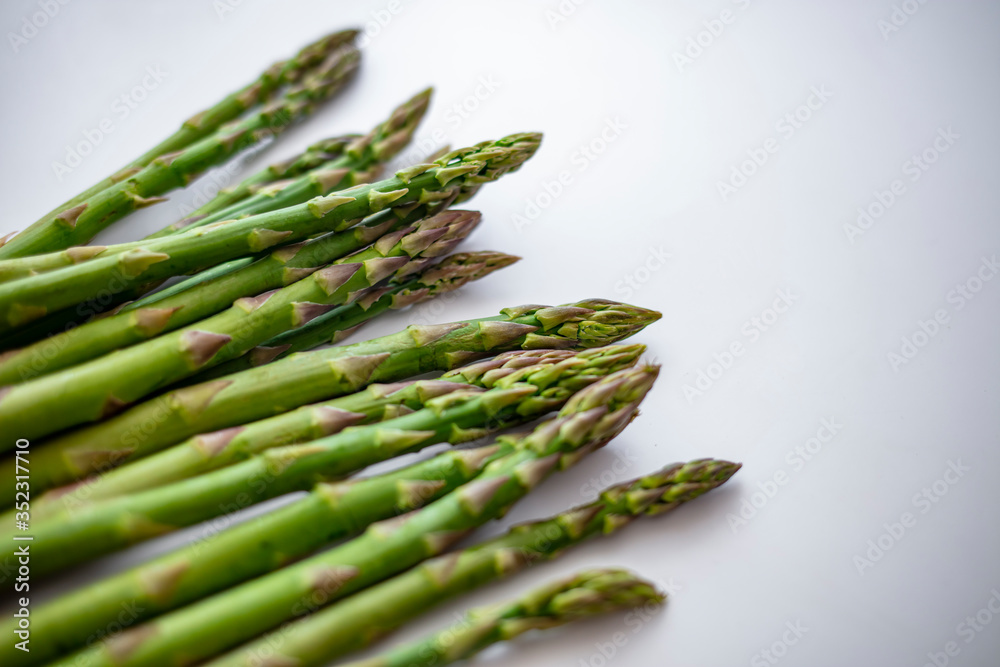 Green asparagus sticks isolated on white background. Studio shot ...