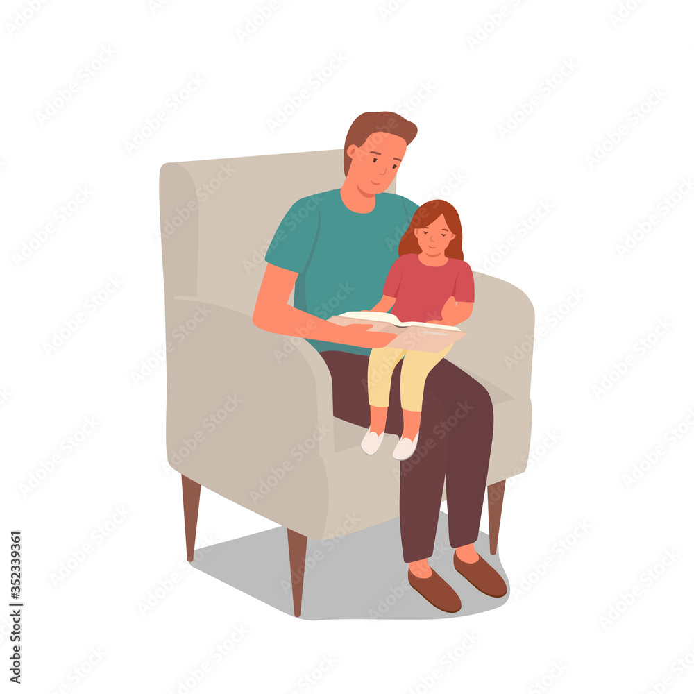 The father is sitting on a chair with a small daughter and reading a ...
