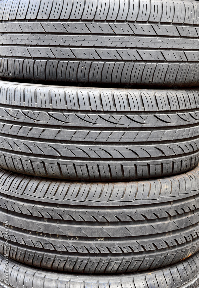 Rubber automotive tires with new treads stacked on each other Stock ...