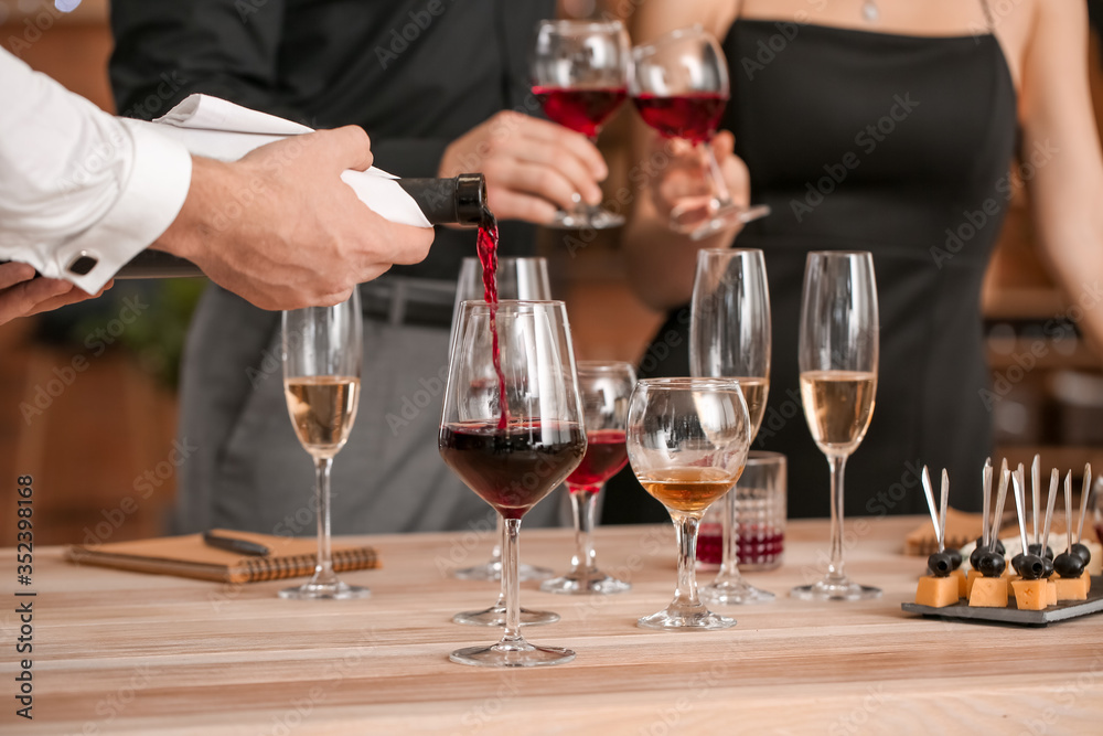 People tasting wine at the restaurant, closeup Stock Photo | Adobe Stock