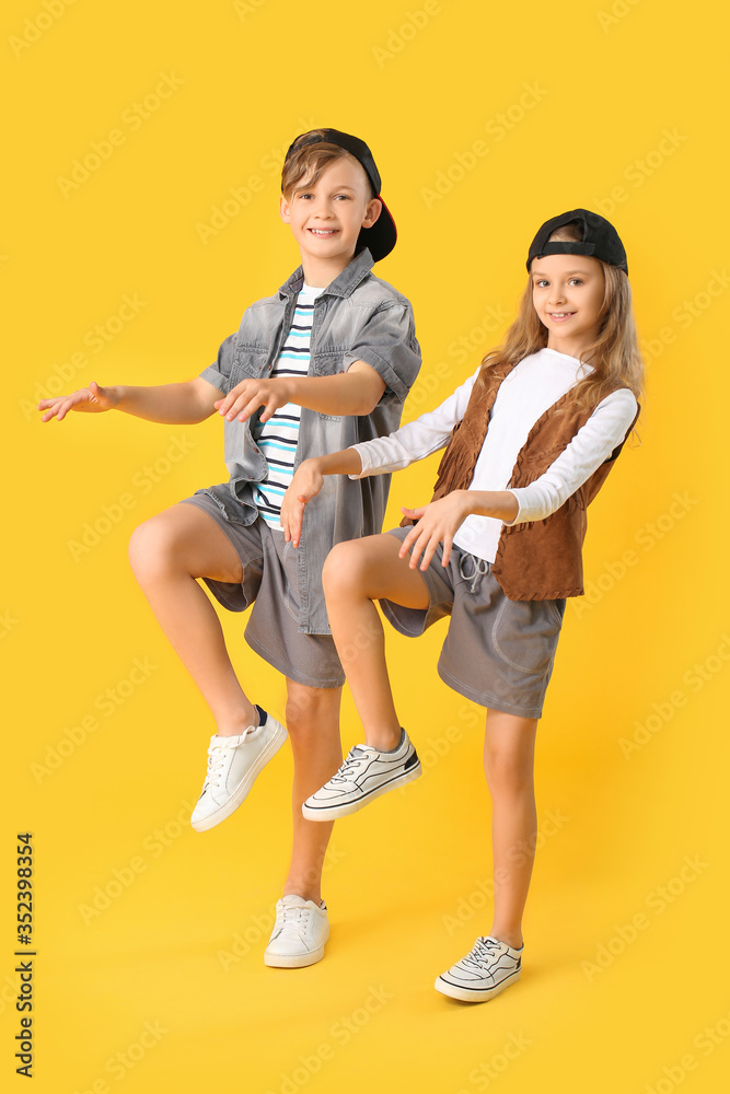 Cute little children dancing against color background Stock Photo ...