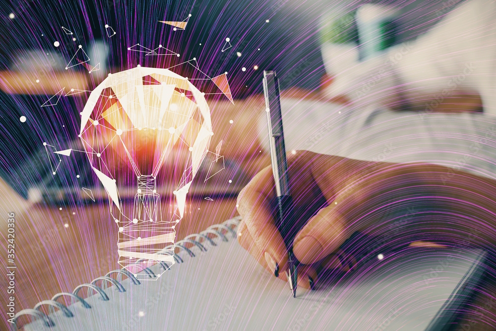 Double exposure of bulb drawing over people taking notes background ...