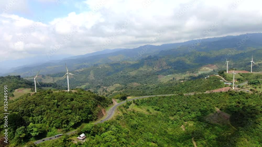 Beautiful cinematic aerial view of the eolian renewable energy wind ...
