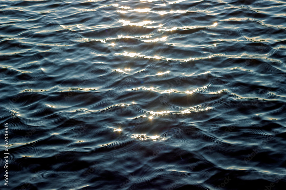 The reflection of the rays of the sun on the blue water in the Golden ...