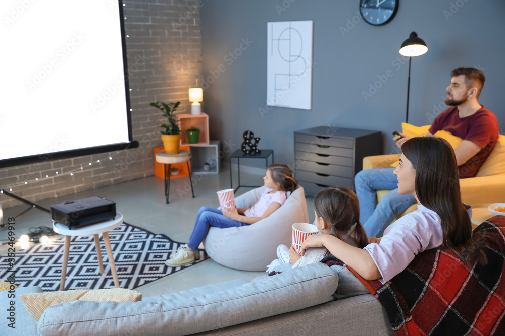 Family Watching A Movie At Home