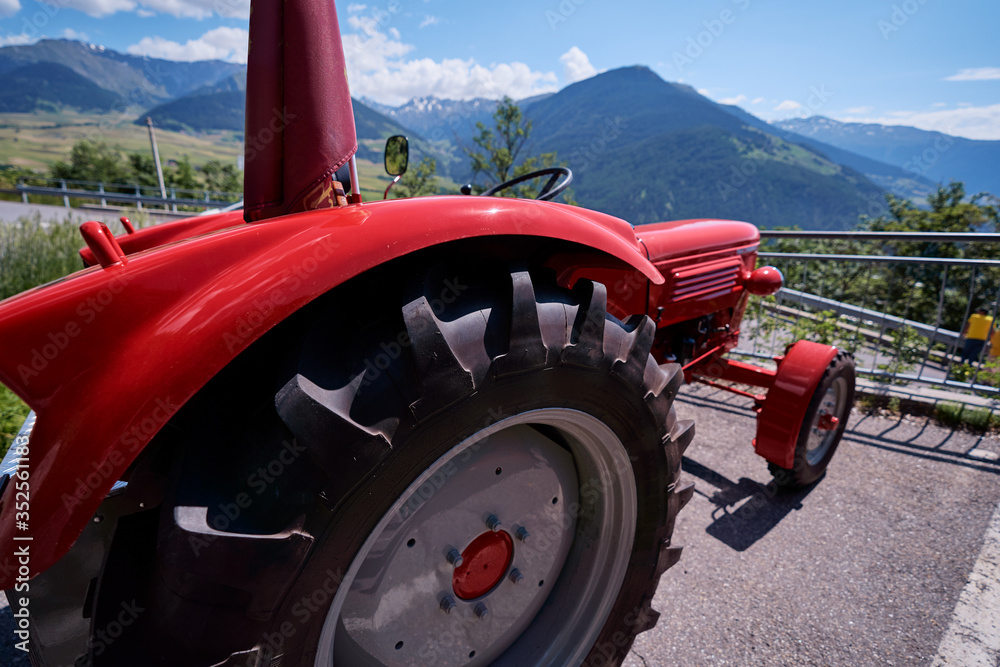 Renovated and repainted vintage retro old small compact utility tractor ...