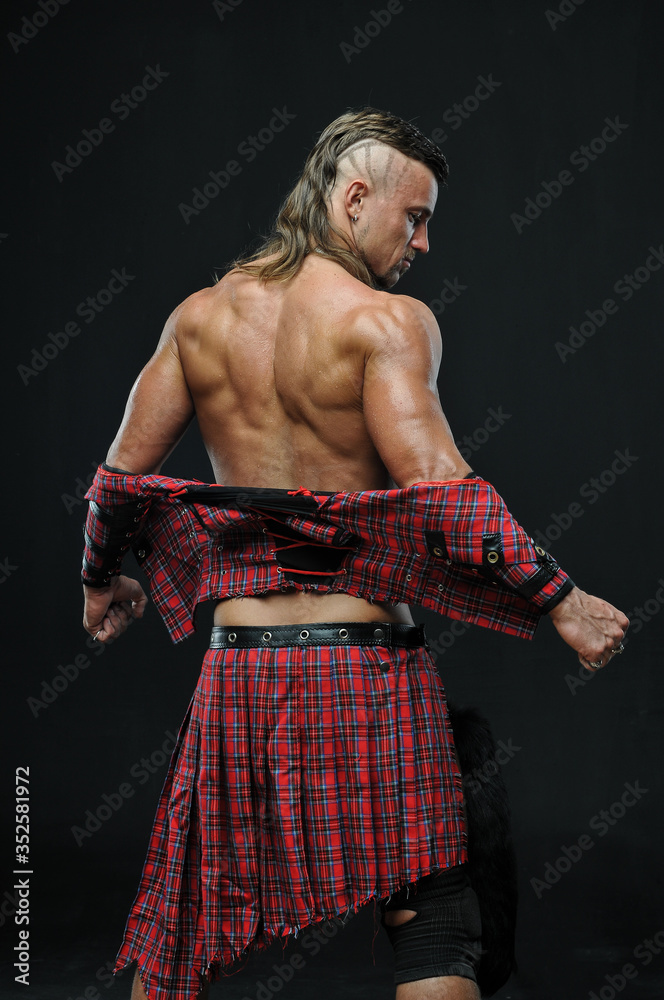 Man in kilt Stock Photo | Adobe Stock