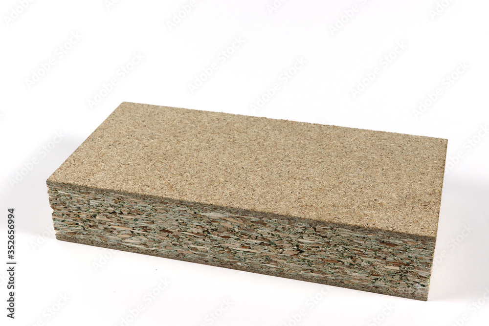 pressed wood texture on a white background. parallelepiped-shaped ...