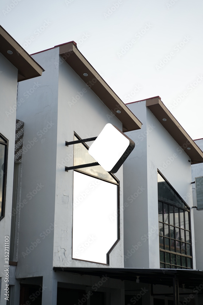 Various forms of signboards in each shop building, to show the identity ...