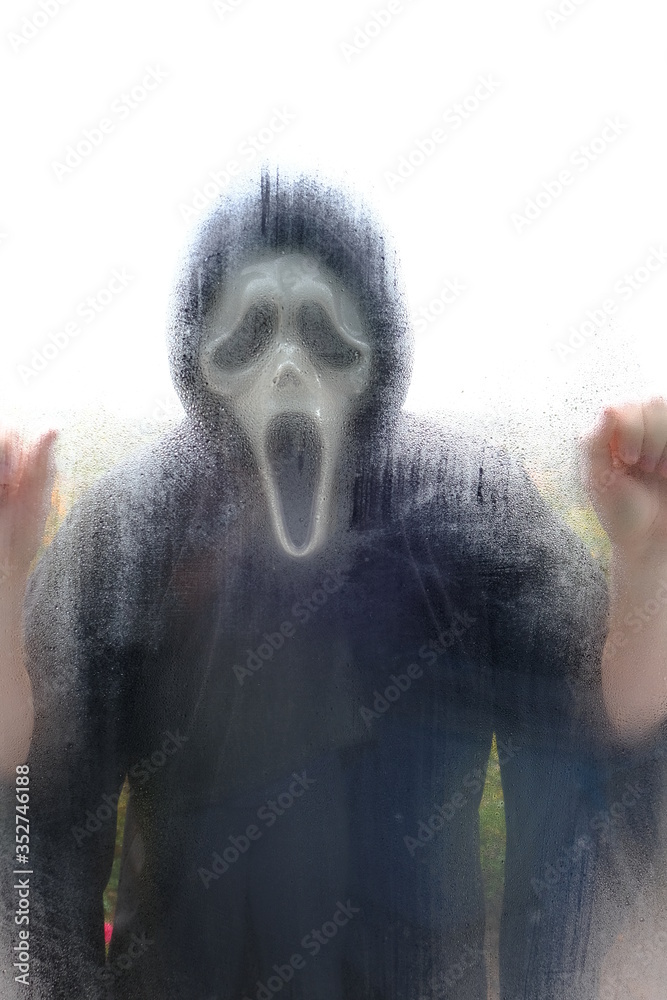 Halloween cosplay costume.Scream mask.Masked killer. Horror and ...