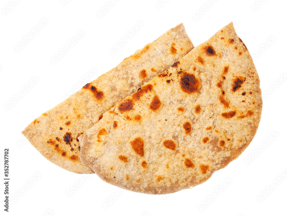 Indian cuisine - pair of tandoori roti (naan flatbread baked in tandoor ...