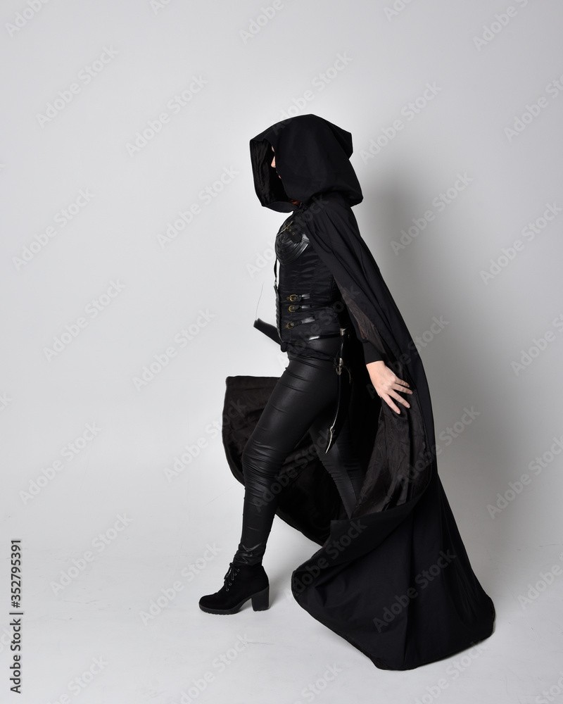 fantasy portrait of a woman with red hair wearing dark leather assassin ...