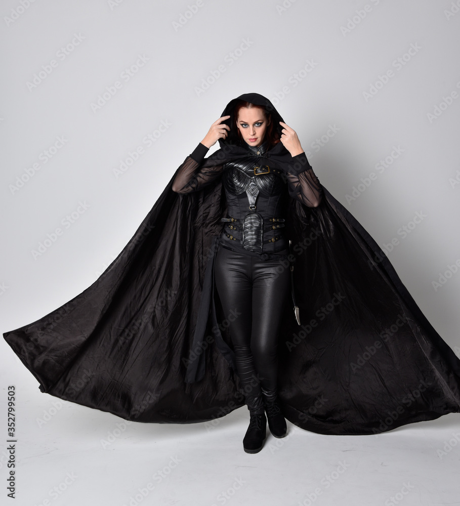 fantasy portrait of a woman with red hair wearing dark leather assassin ...