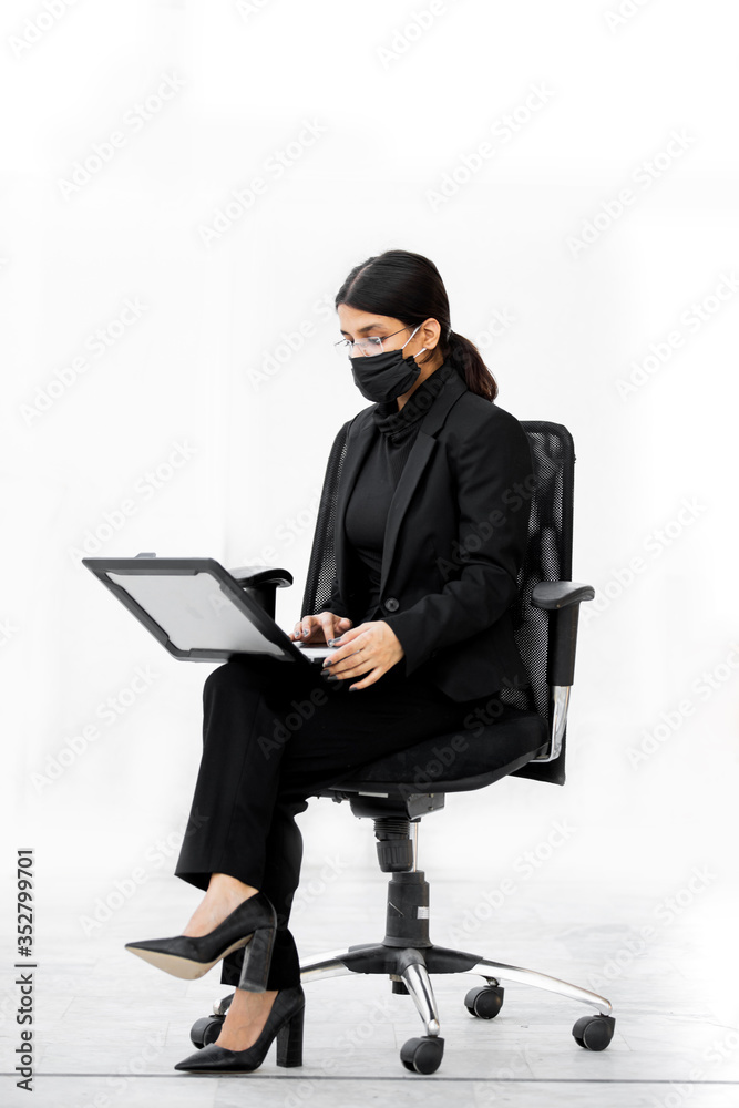 Masked woman. A woman dressed up in office or student attire wearing a ...