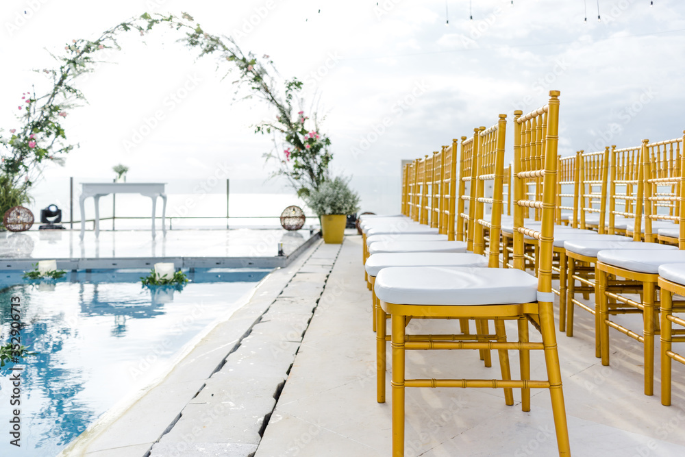 Arrangement of guest chairs for the blessing ceremony and wedding vows ...