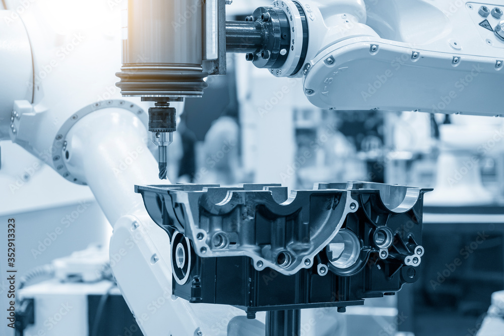 The milling spindle attached with the robotics arm finishing cut the ...