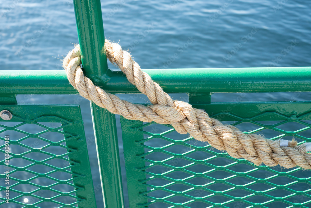 Rope line on a side railing of the coastal ferry boat. Stock Photo ...