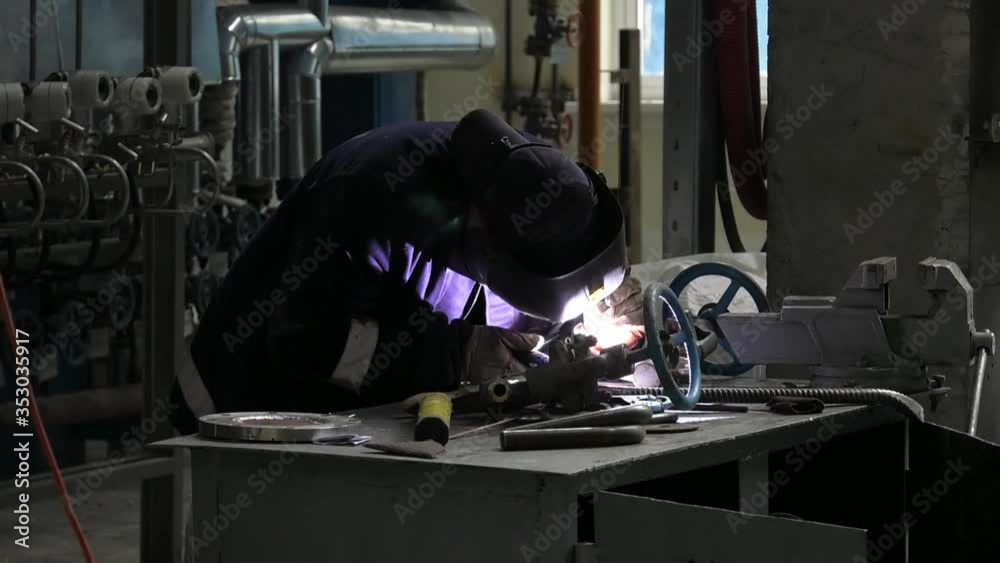 Steel welder Are connected together into larger pieces, sparking the ...