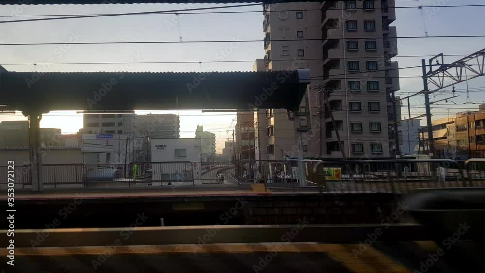 City downtown skyline from subway train window view. Osaka tourist ...