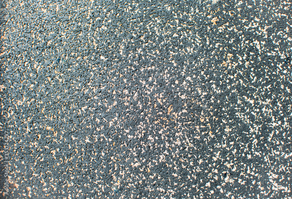 Flexible tile for playground. Tile made from a mixture of rubber crumb ...