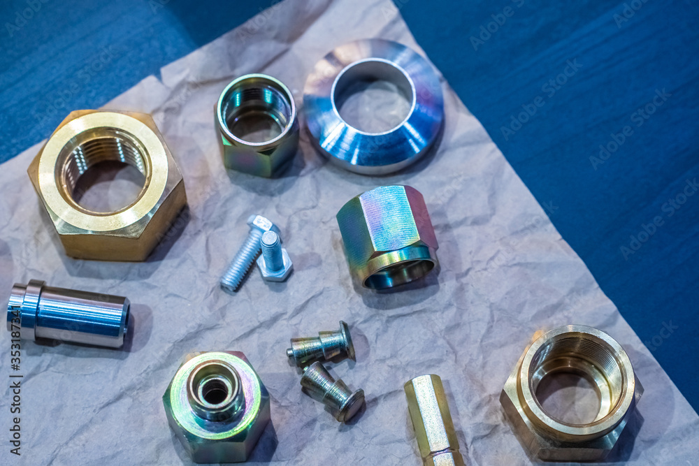 Bolts and washers are on the table. Female scratch of different types ...