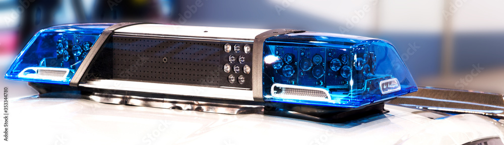 Poster Blue lights on roof of police car – Wall Art | UkPosters