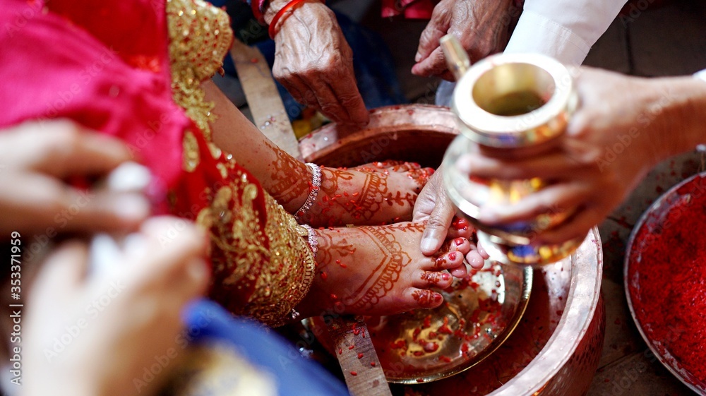 A ceremony of washing feet to the bride before her marriage by her ...