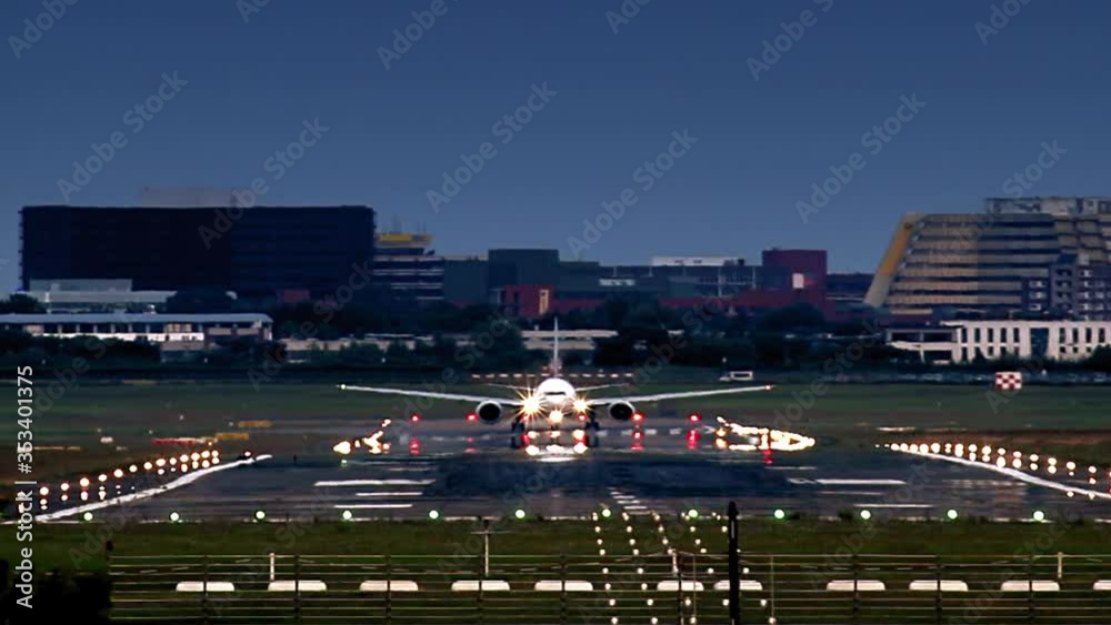 Airplane during take off from Hamburg airport (HAM). Late evening with ...