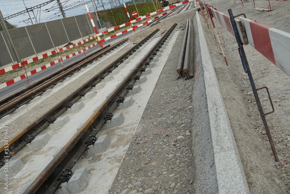 new tram line rails installed in the ground on a concrete base and some ...