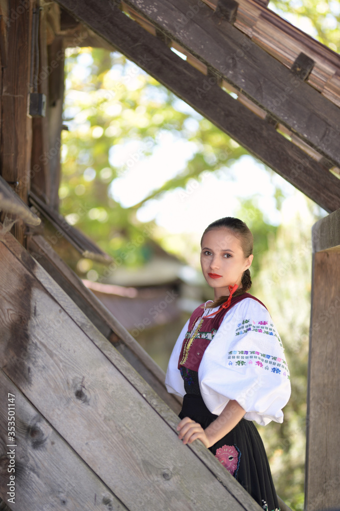Young beautiful slovak woman in traditional costume. Slovak folklore ...