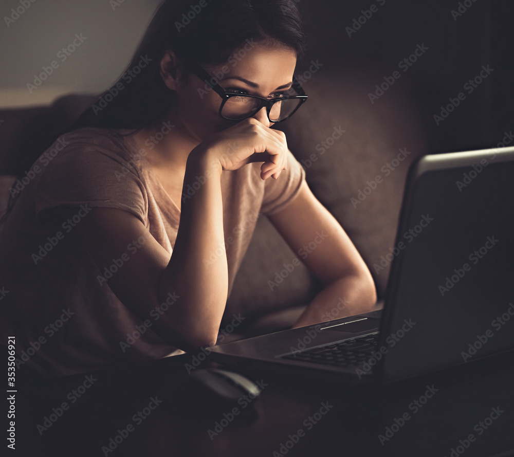 Smiling thinking young beautiful woman in eye glasses looking on ...