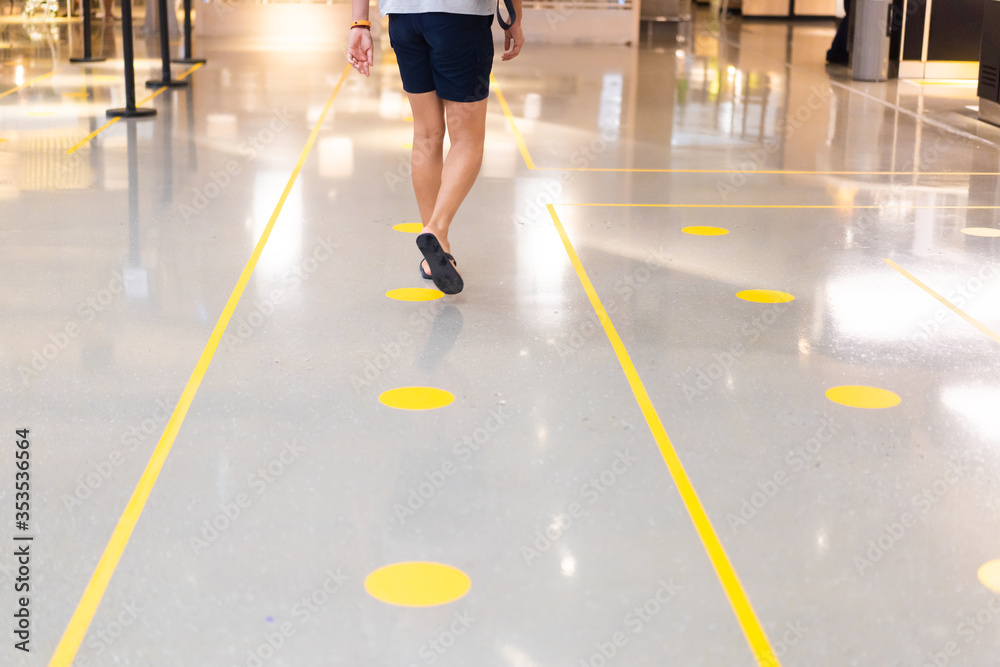 Man walking yellow dot in the mall.Please Keep Distance.Social ...