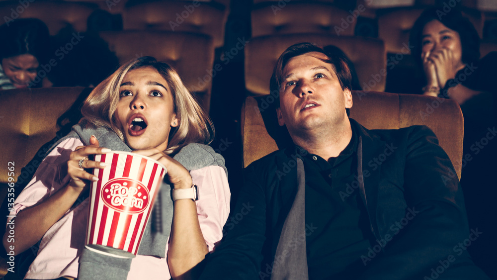 People audience watching movie in the movie theater cinema. Group ...