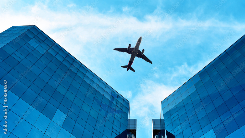 high office buildings for business and airplane flying Stock Photo ...