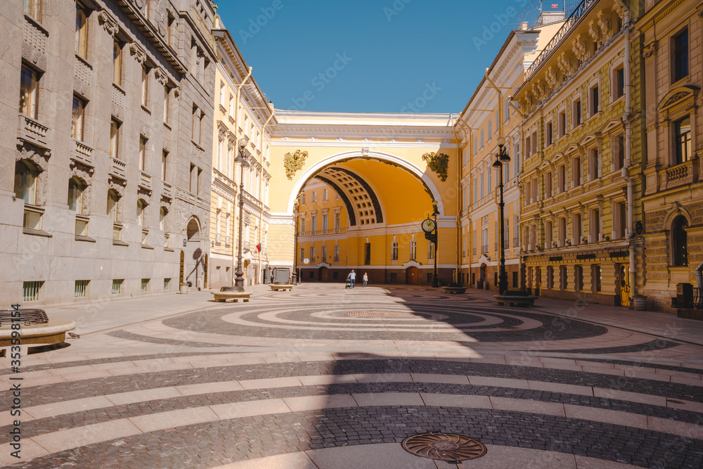 Yellow arch leading to the Palace square to the Hermitage Museum in ...