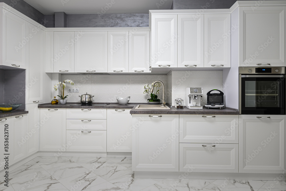 Clean and minimalistic modern white kitchen interior Stock Photo ...