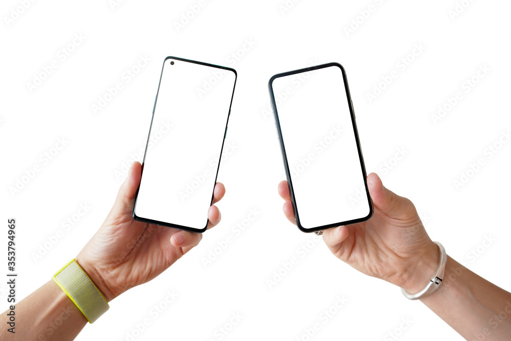Man hands holding side by side two smartphones. Comparing, analyzing or ...