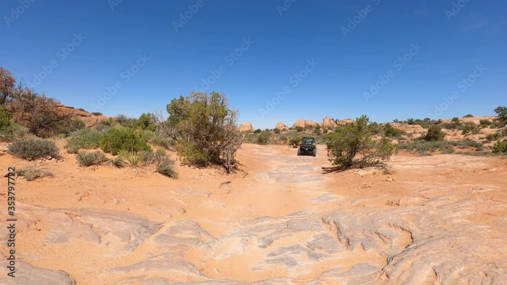 Riding off road rought desert Utah landscape Moab POV 4K. In south ...