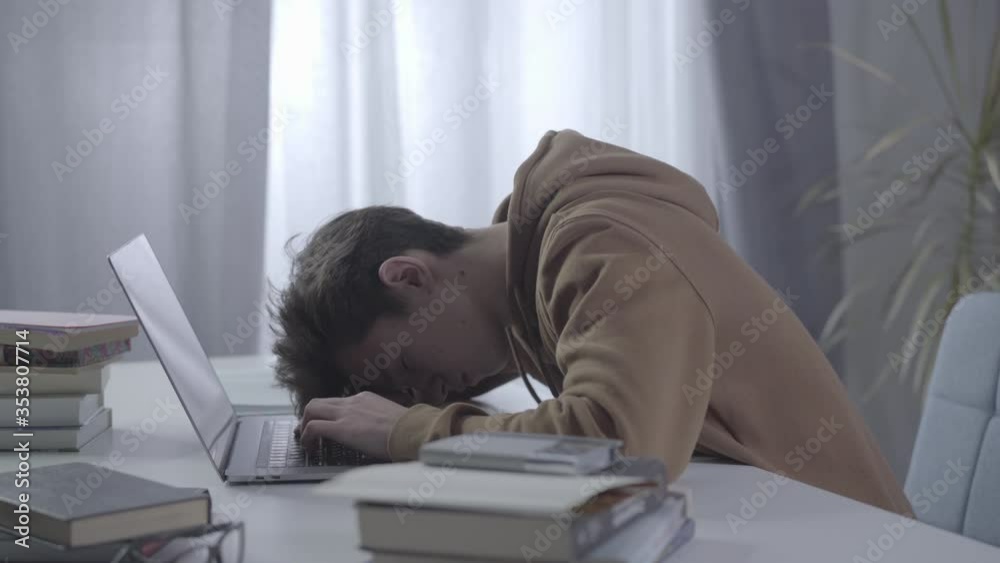 Tired college student getting asleep. Side view portrait of sleepy ...